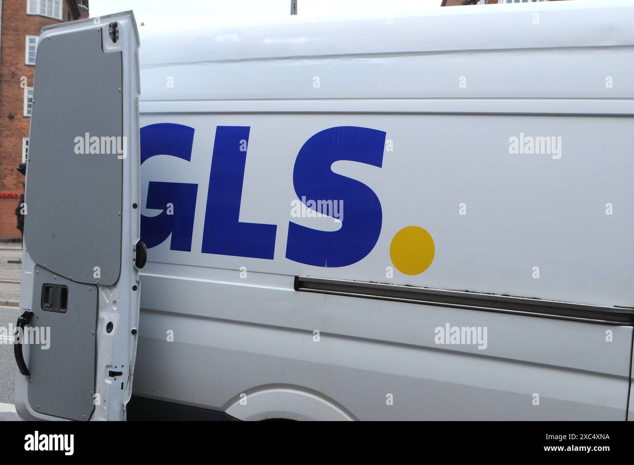 Copenhagen/ Denmark/14 JUNE 2024/GLS delivery male in action and gls ...