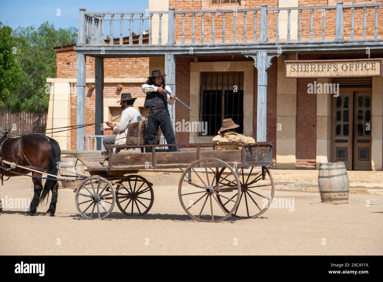 Cowboys on a Wild West Film Set Stock Photo - Alamy