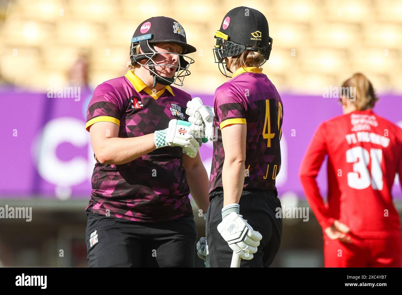Birmingham, UK. 14th June, 2024. Abbey Freeborn fist bumps Amy Jones as ...