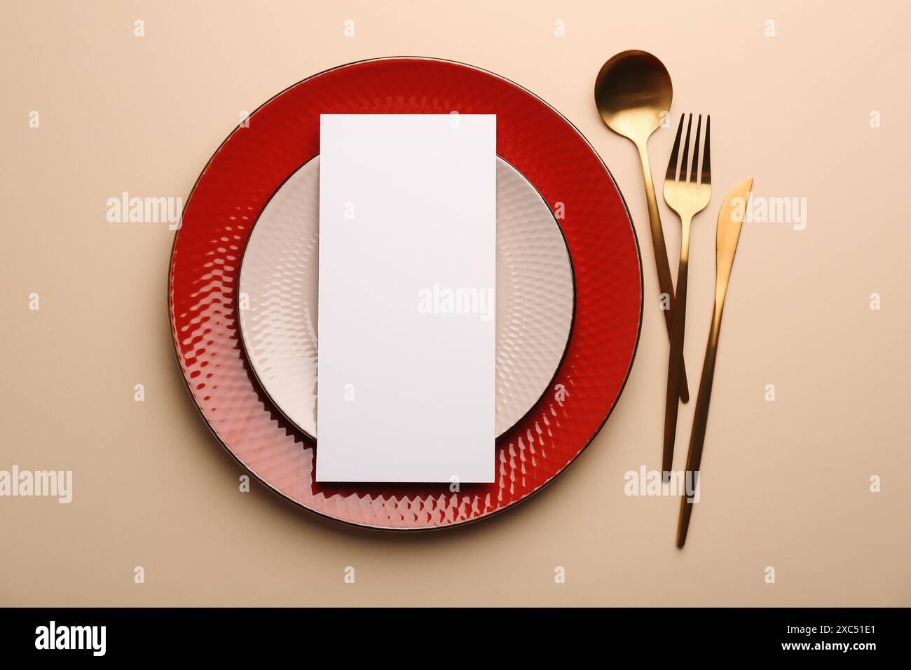 Empty menu, plates and cutlery on beige background, top view. Mockup ...