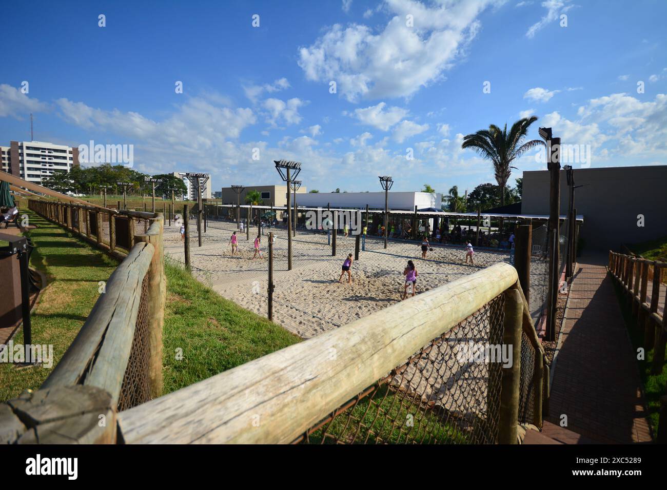 Athletes playing in beach tennis competition Stock Photo - Alamy