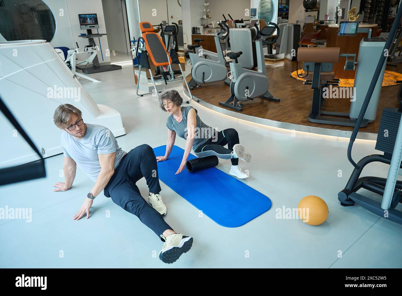 Patient performs exercises in the gym on the karimate Stock Photo - Alamy