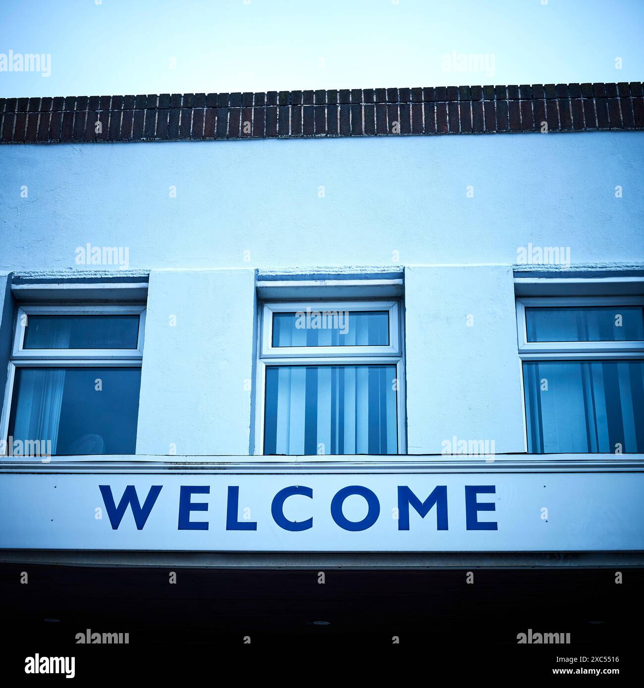 Welcome sign above church entrance Stock Photo - Alamy