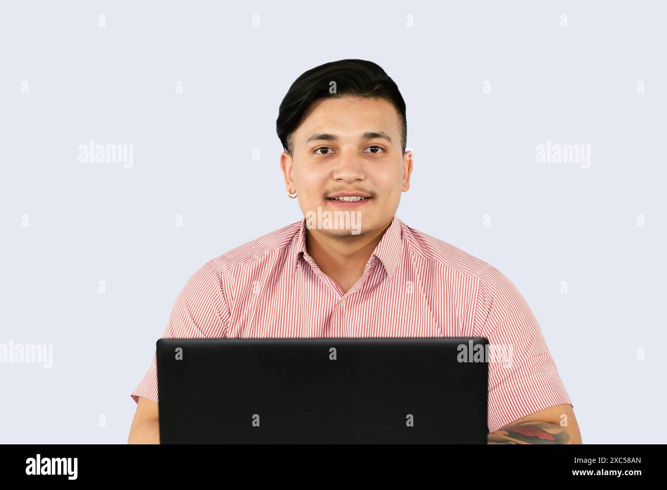 Asian male reception desk hi-res stock photography and images - Alamy