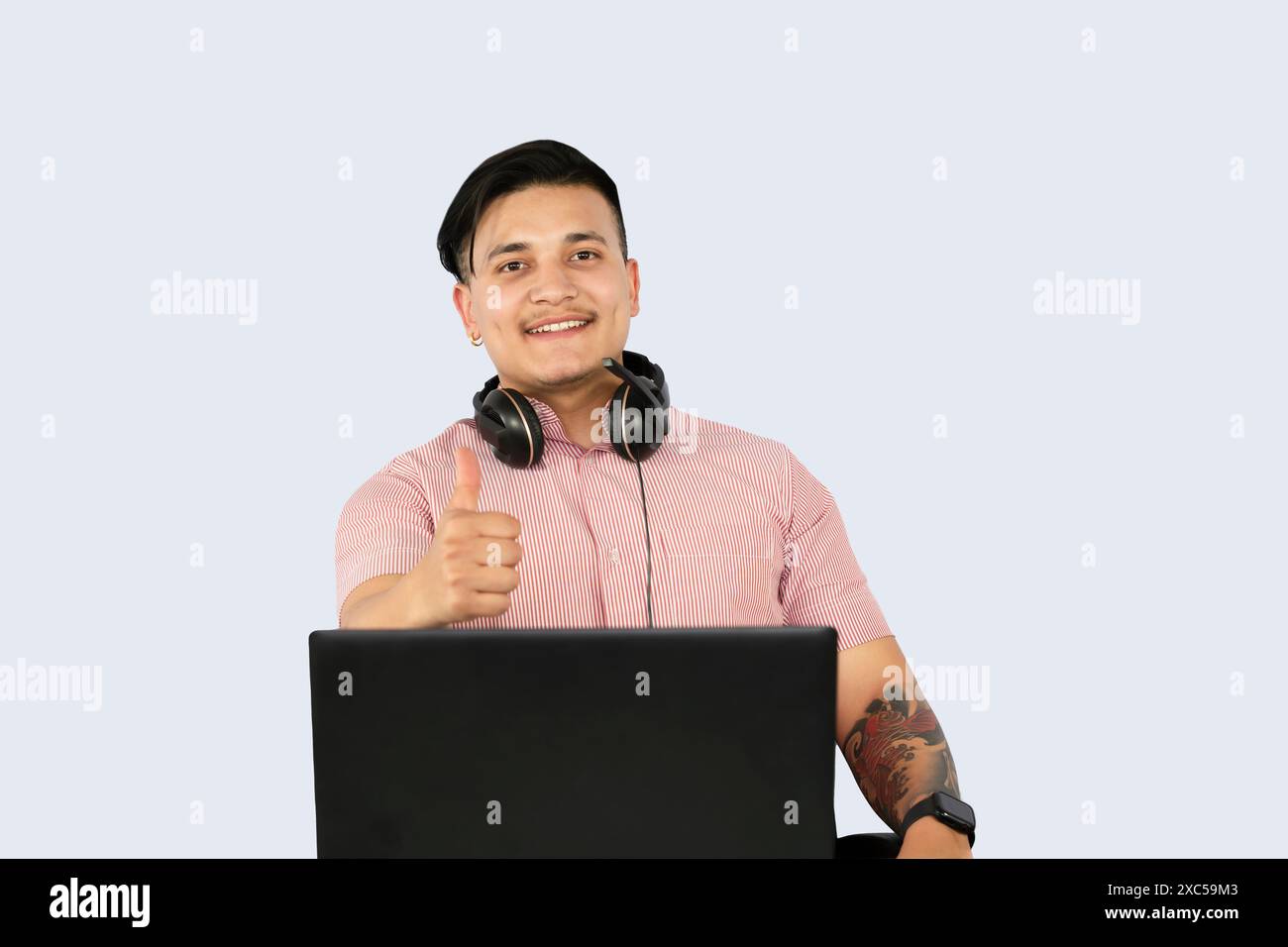 Asian male reception desk hi-res stock photography and images - Alamy