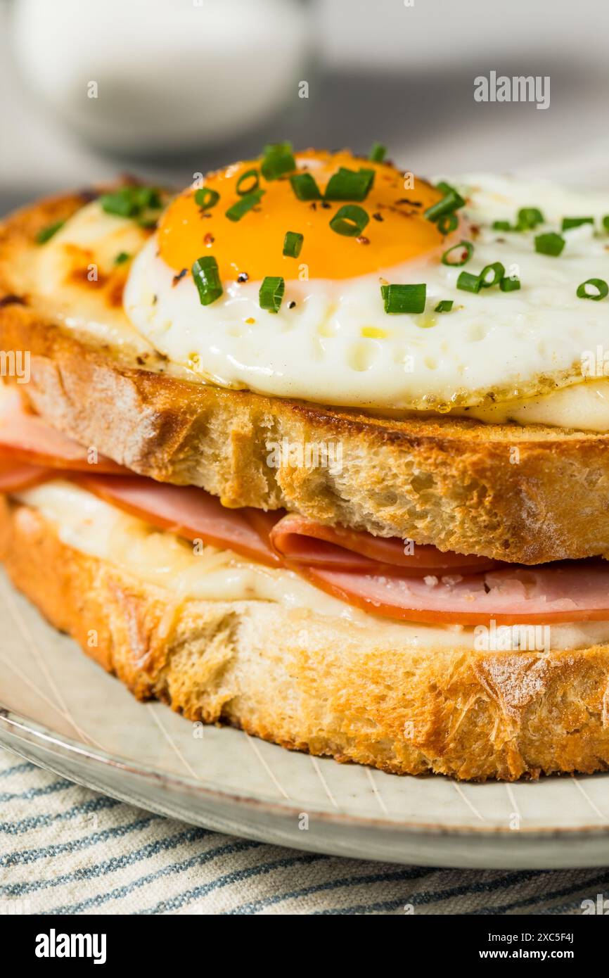 French Croque Madame Sandwich with Ham and Egg Stock Photo - Alamy