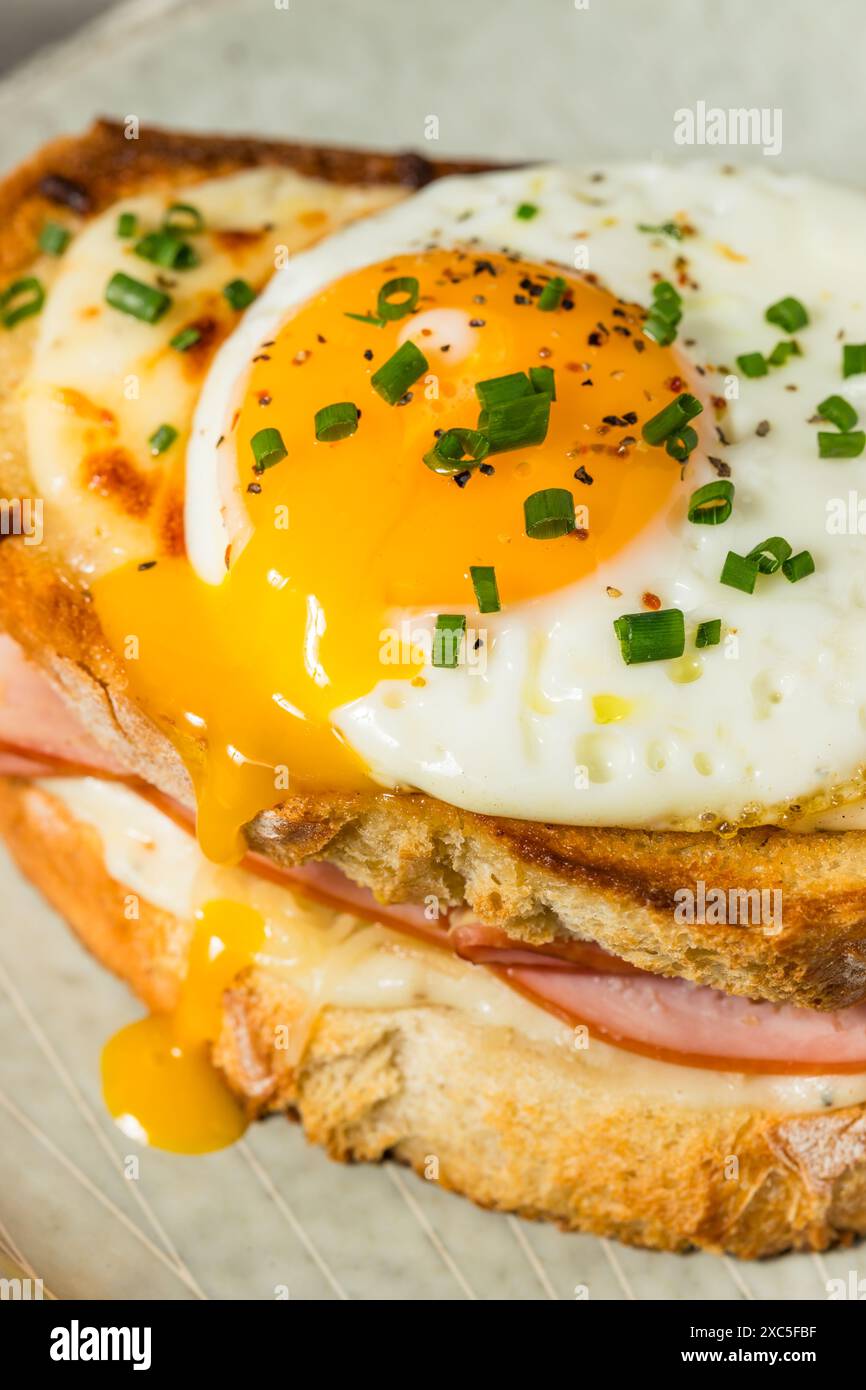 French Croque Madame Sandwich with Ham and Egg Stock Photo - Alamy