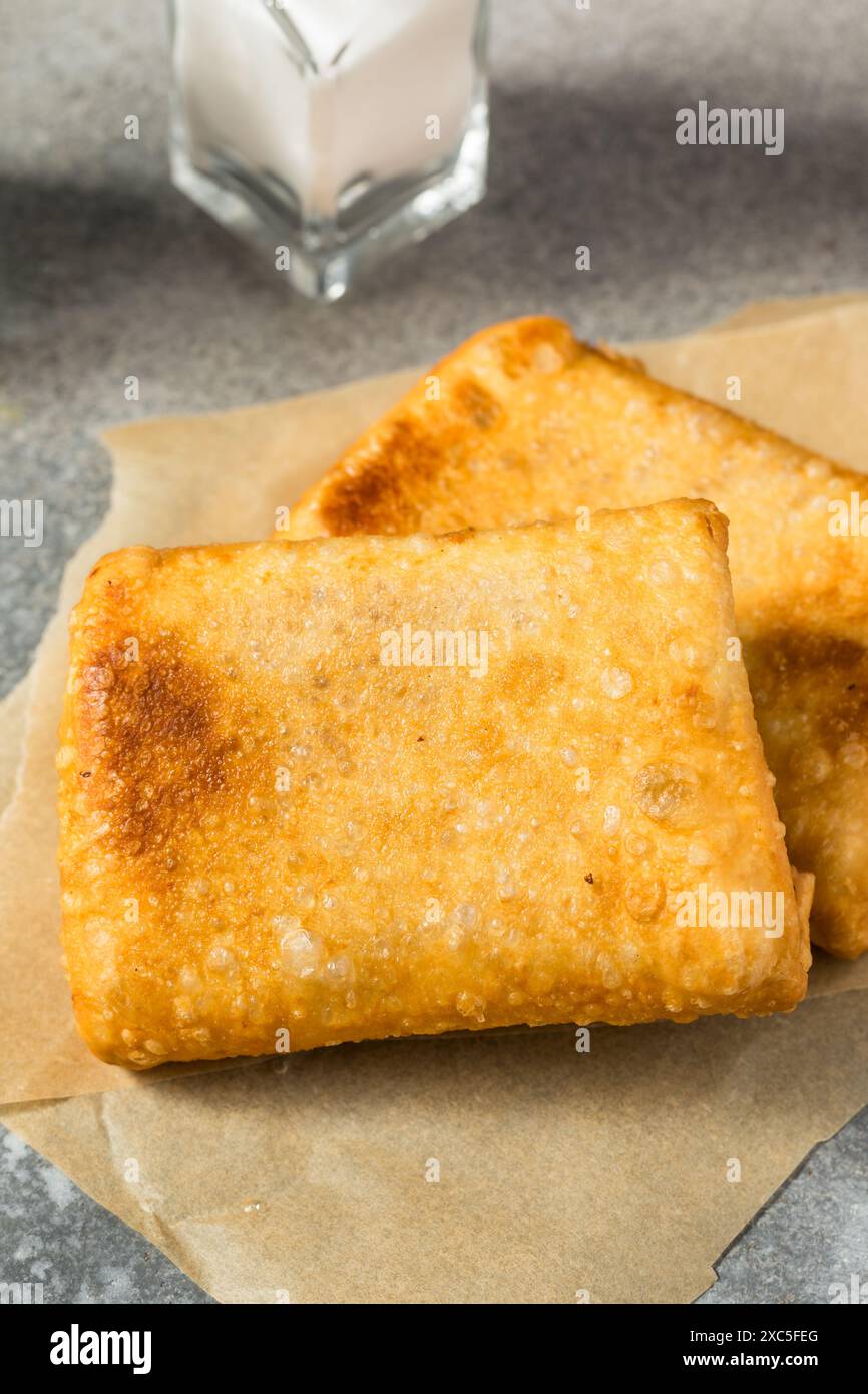 Chicago Style Pizza Puff Pocket with Sauce and Cheese Stock Photo - Alamy