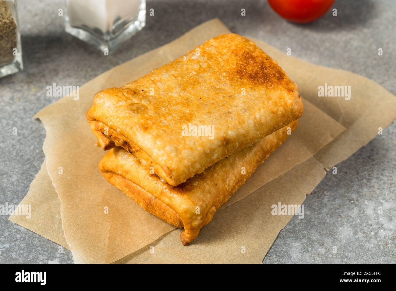 Chicago Style Pizza Puff Pocket with Sauce and Cheese Stock Photo - Alamy