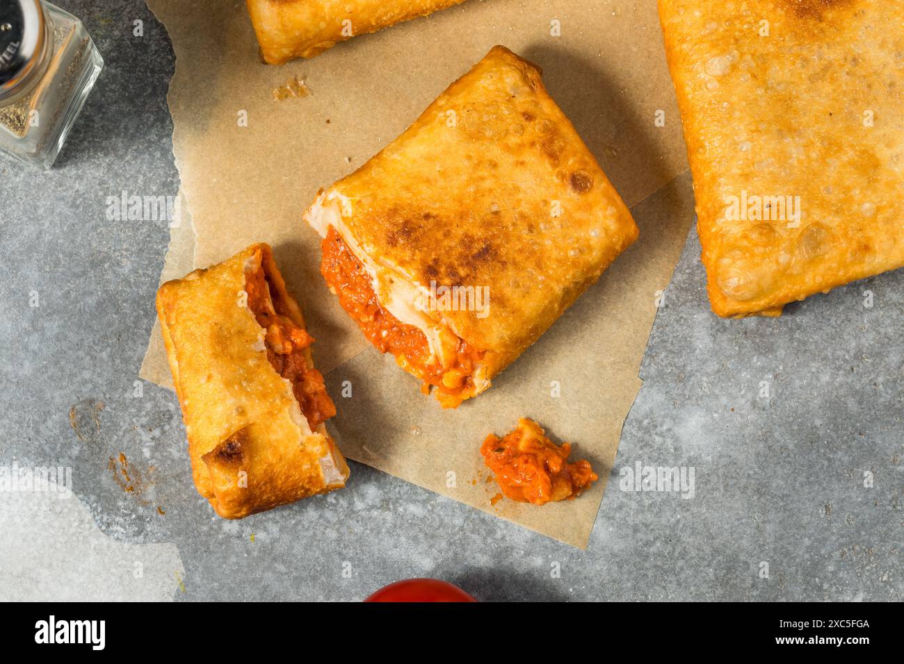Chicago Style Pizza Puff Pocket with Sauce and Cheese Stock Photo - Alamy