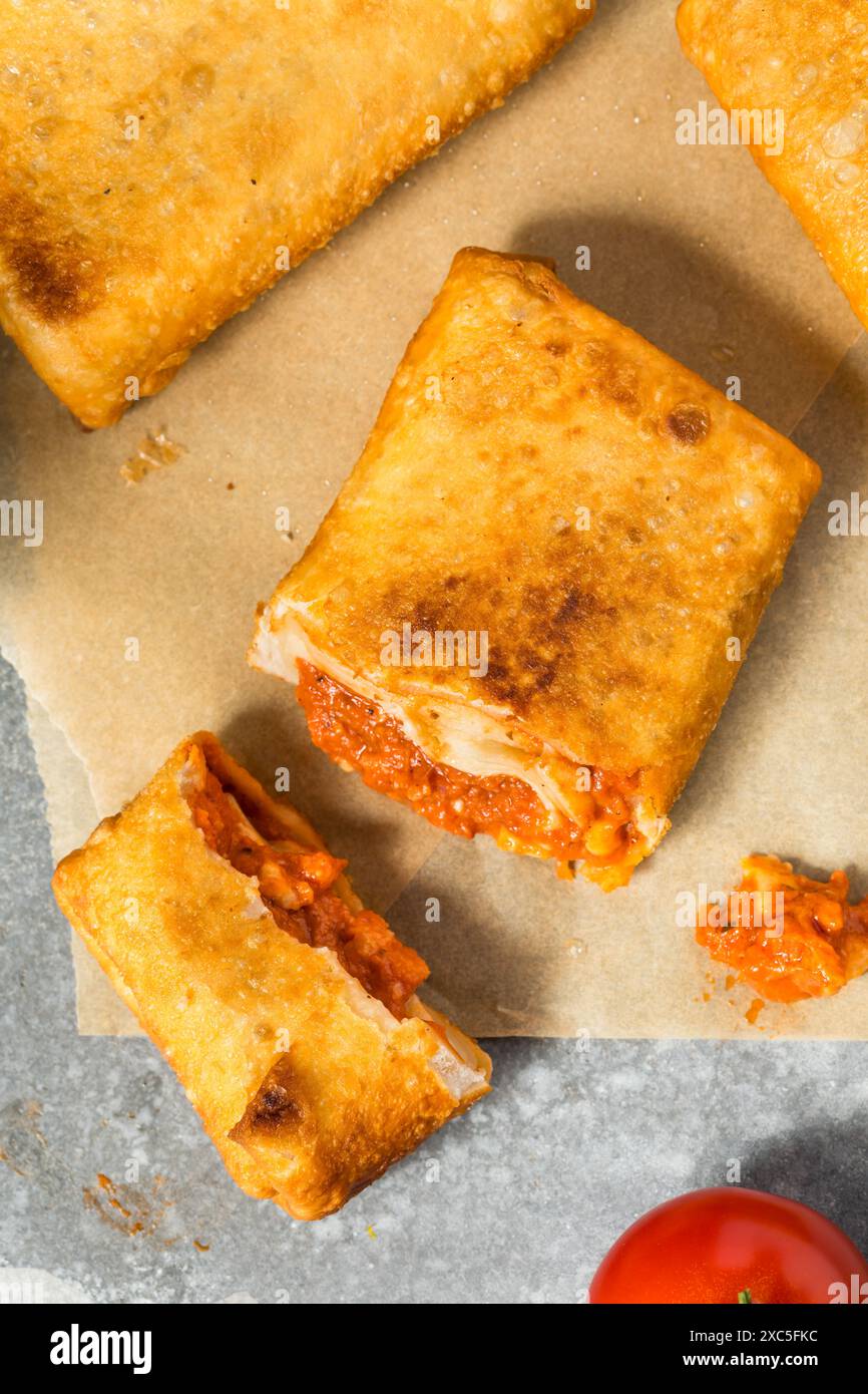 Chicago Style Pizza Puff Pocket with Sauce and Cheese Stock Photo - Alamy