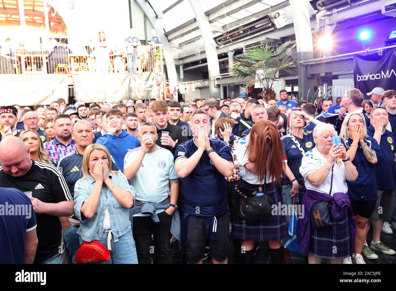 Scotland fans react at the BAaD, Glasgow, watching the UEFA Euro 2024 ...