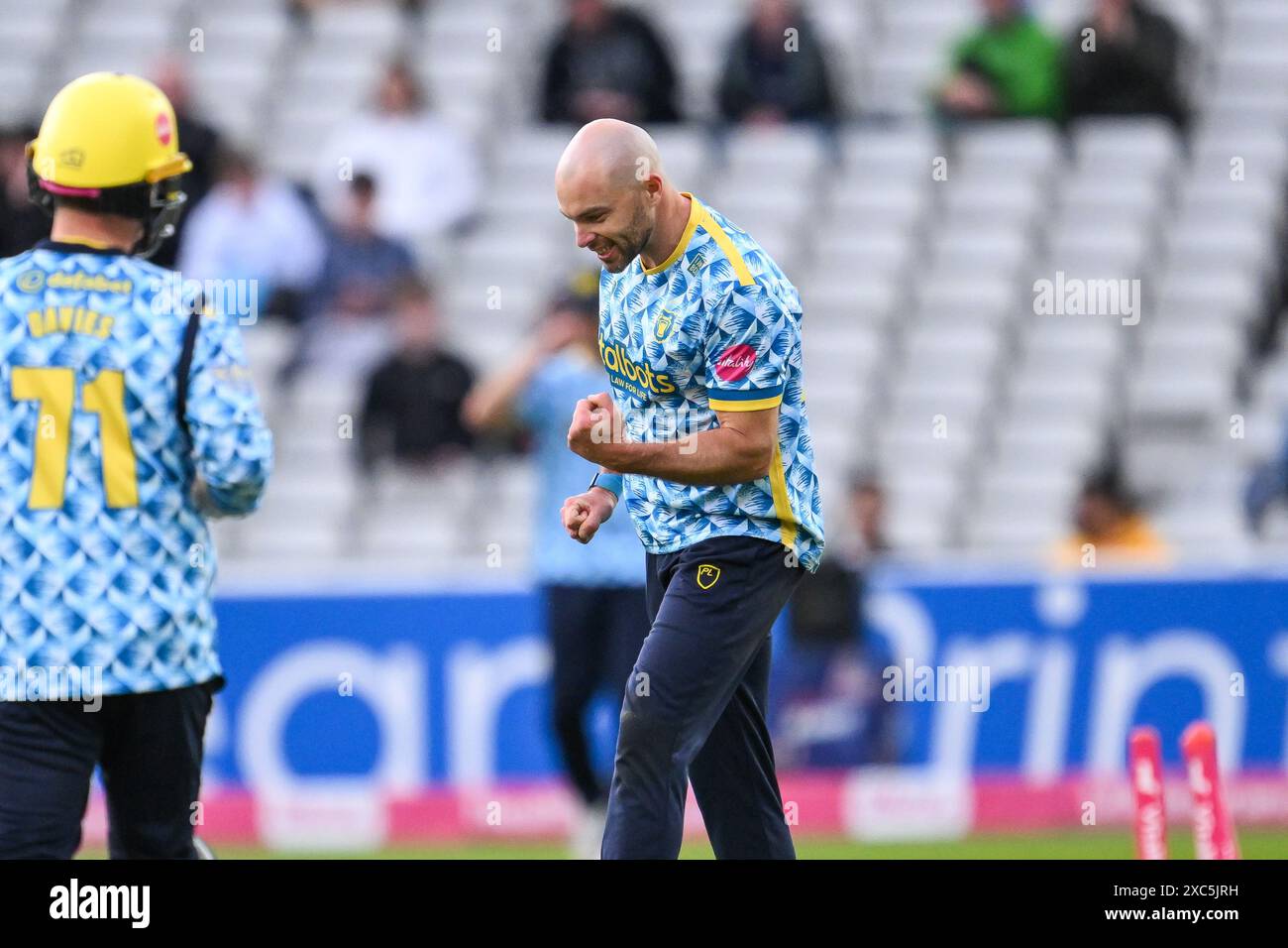 Dan Mousley of Birmingham Bears celebrates bowling Jafer Chohan of ...