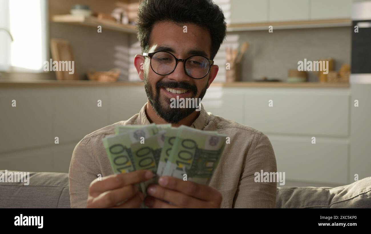 Happy Indian Arabian man rich businessman cash owner celebrate money ...