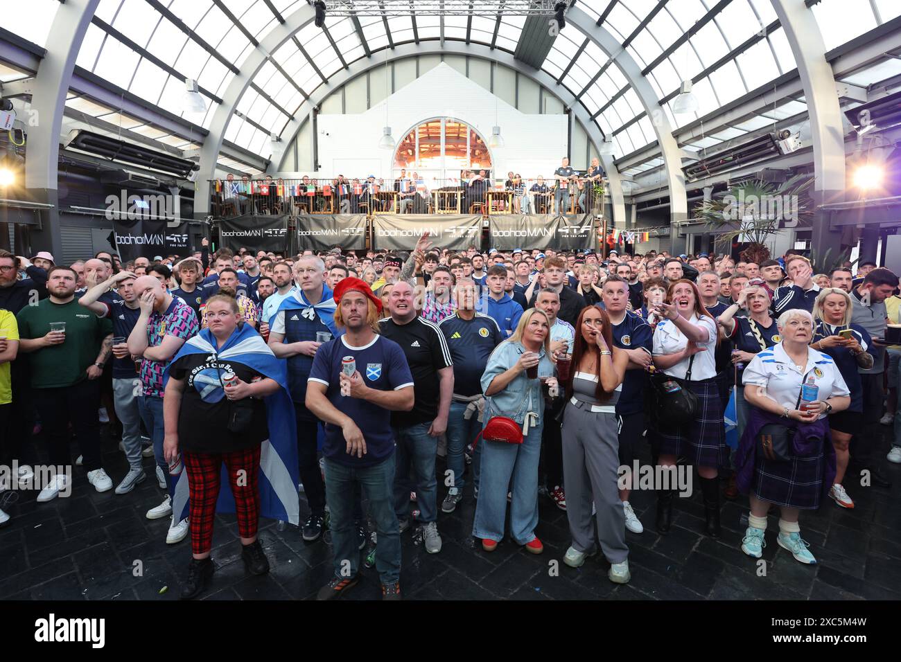Scotland fans react at the BAaD, Glasgow, watching the UEFA Euro 2024 Group A match between ...