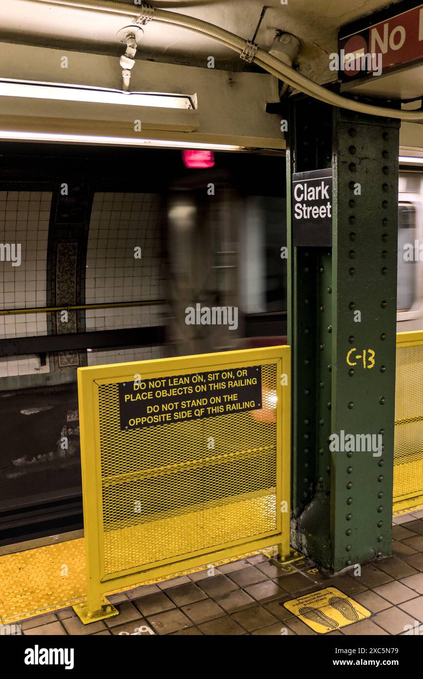 Safety barrier for protection installed on platform of Clark Street subway station in Brooklyn ...