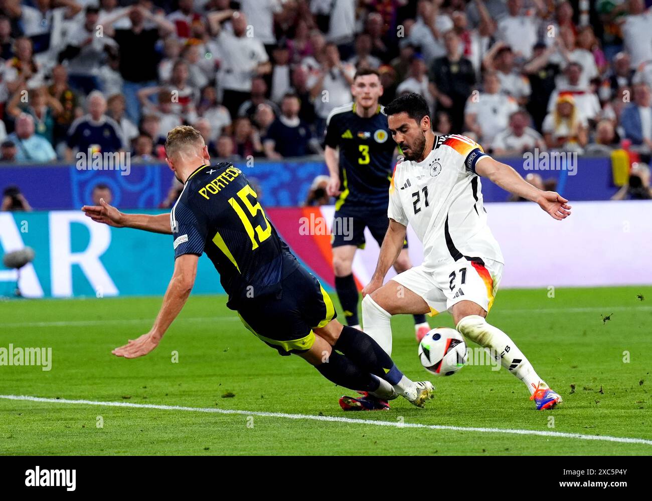 Scotland's Ryan Porteous (left) fouls Germany's Ilkay Gundogan ...