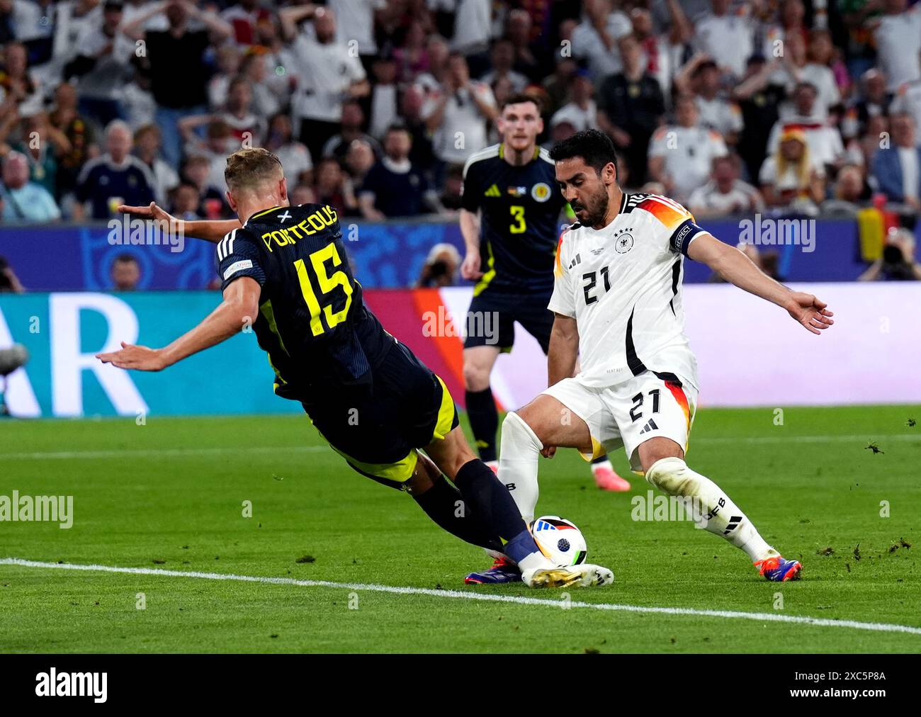 Scotland's Ryan Porteous (left) fouls Germany's Ilkay Gundogan ...