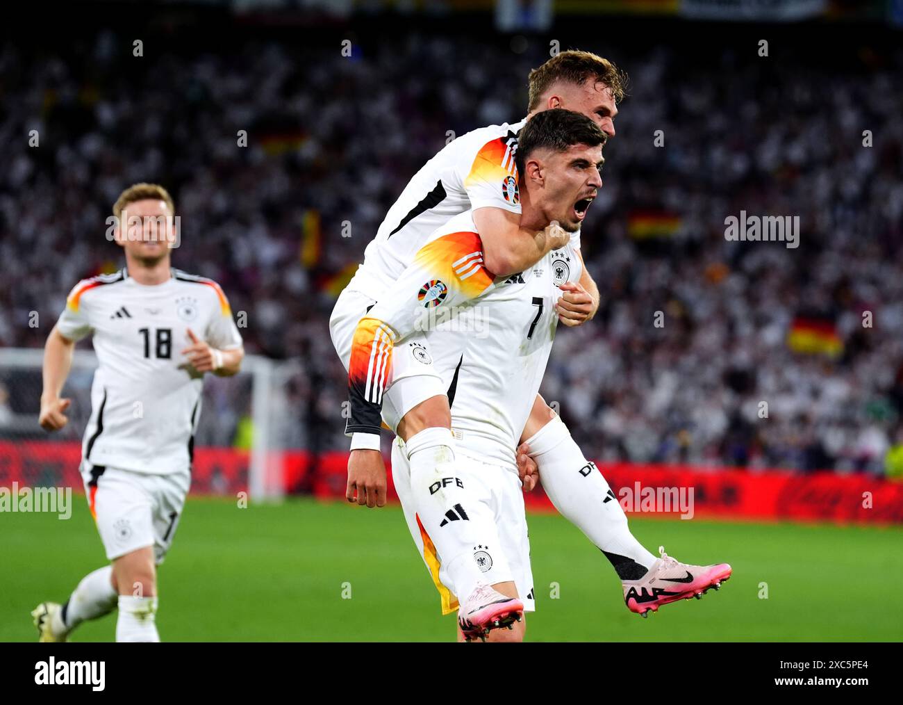 Germany's Kai Havertz (bottom) celebrates after scoring their side's ...