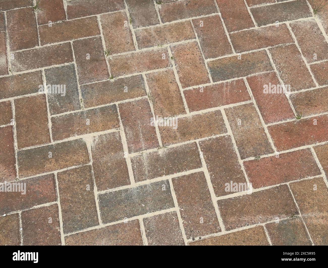 Monoblock paving blocks on patio with sand between joints Stock Photo ...
