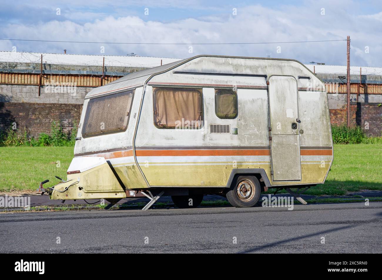 Caravan abandoned and dumped in street waiting to be removed Stock ...