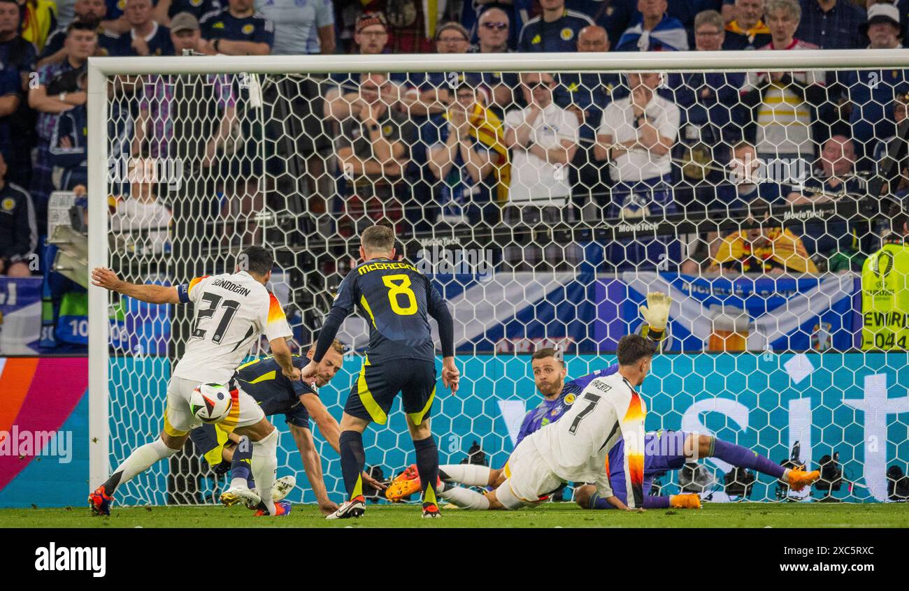 Munich, Germany. 14th Jun 2024. Ryan Porteous (Sco) sees the red card ...