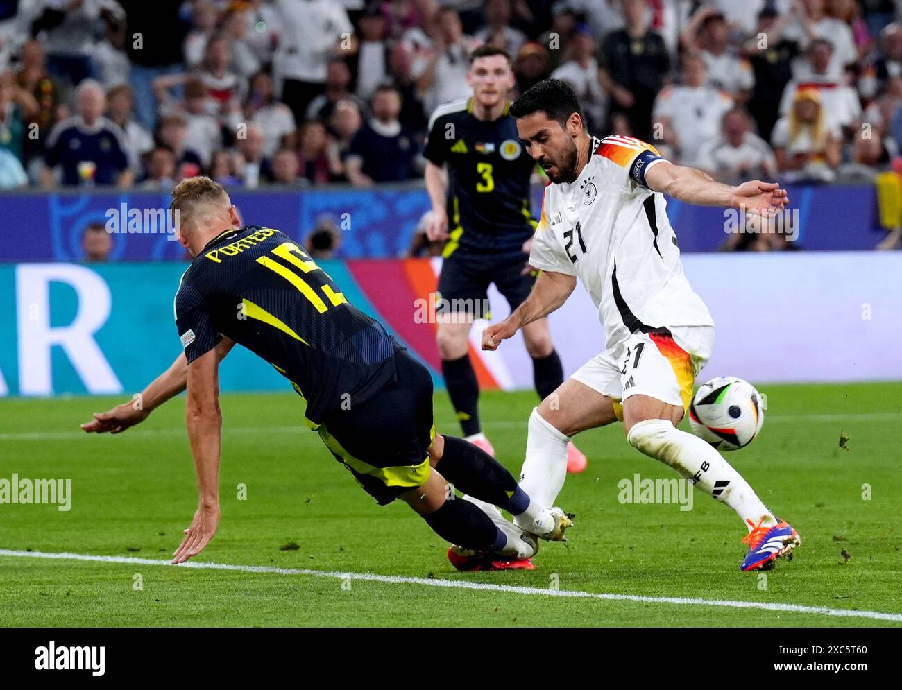 Scotland's Ryan Porteous (left) fouls Germany's Ilkay Gundogan ...