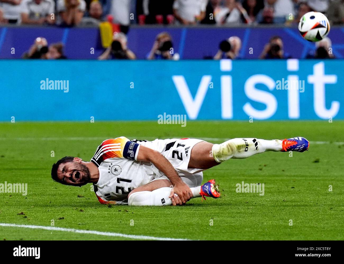 Germany's Ilkay Gundogan after being fouled by Scotland's Ryan Porteous ...