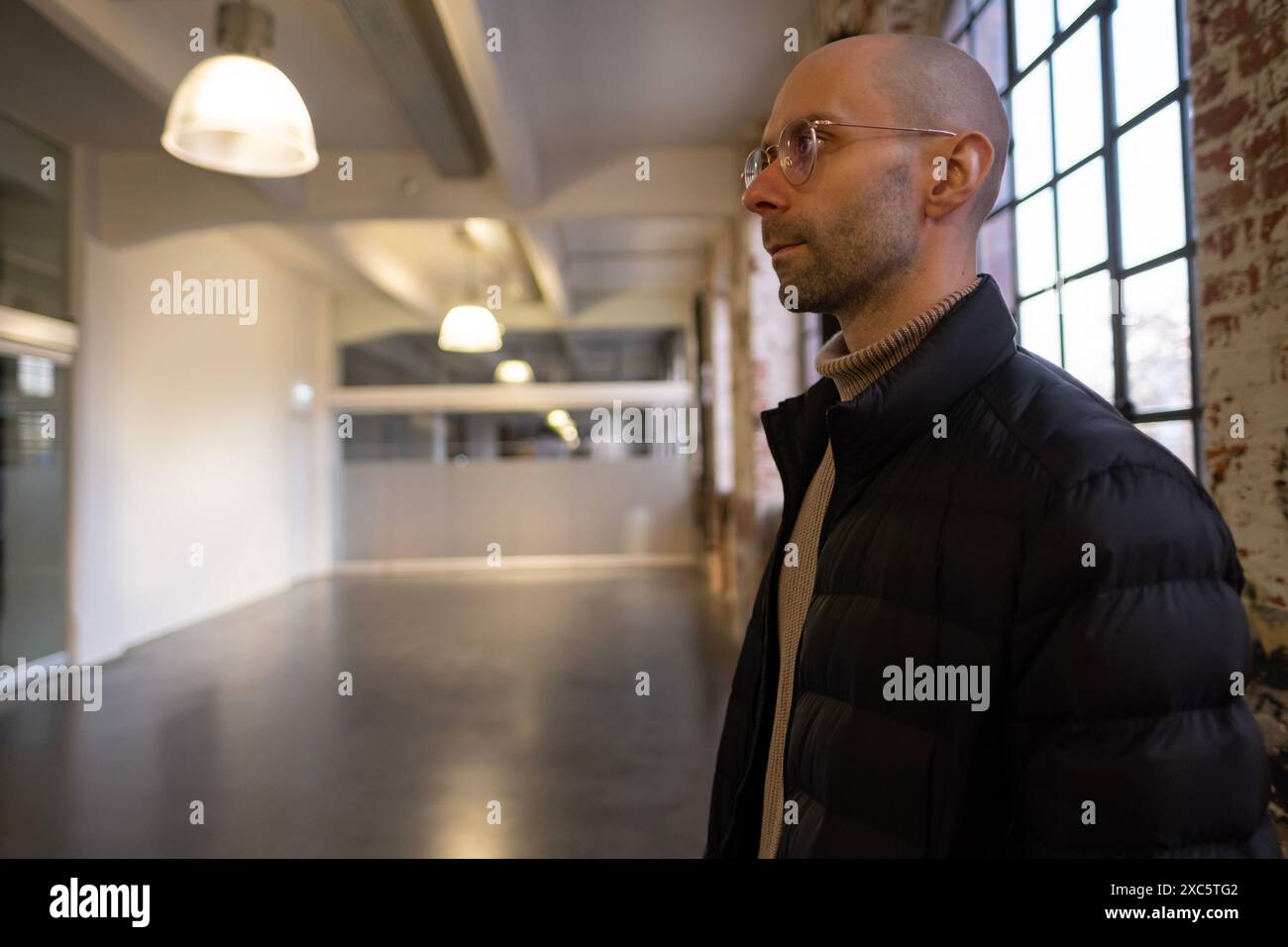 sad young man 35-year-old out window, emotional distress and life ...