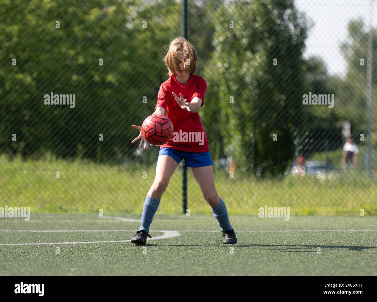 Small Footballer At Summer Match Shows Great Potential Stock Photo - Alamy