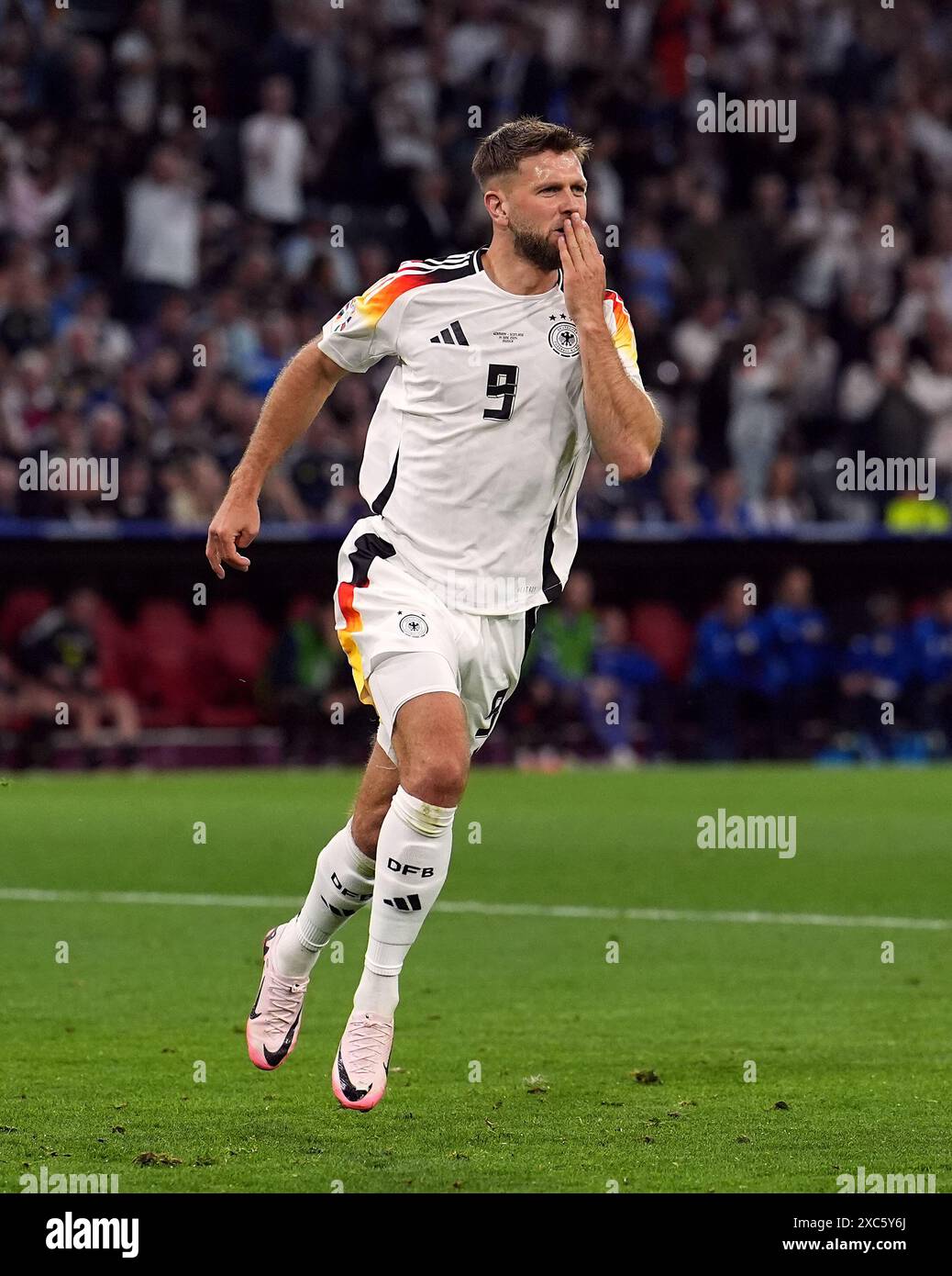 Germany's Niclas Fullkrug celebrates scoring their side's fourth goal ...