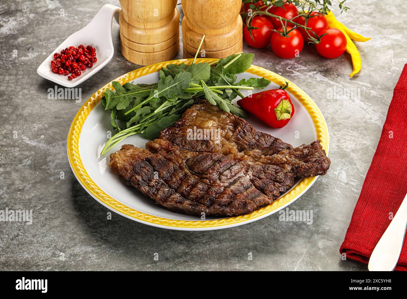 Grilled chuck roll beef steak with arugula Stock Photo - Alamy