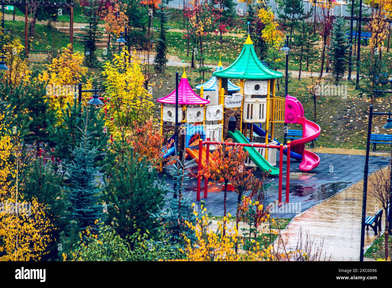 Colorful playground in autumn, symbolizing childhood memories ...