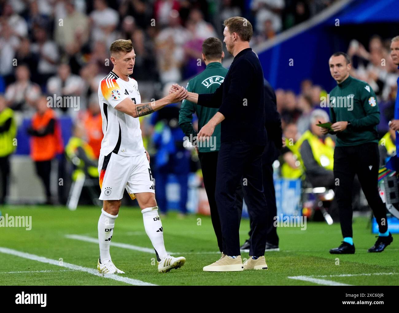 Germany's Toni Kroos shakes hands with manager Julian Nagelsmann after ...