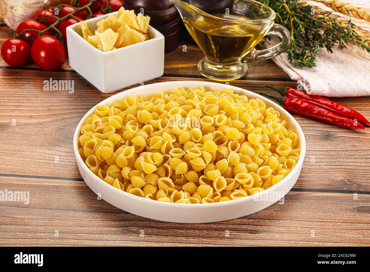 Italian cuisine - dry conchiglie shell pasta Stock Photo - Alamy