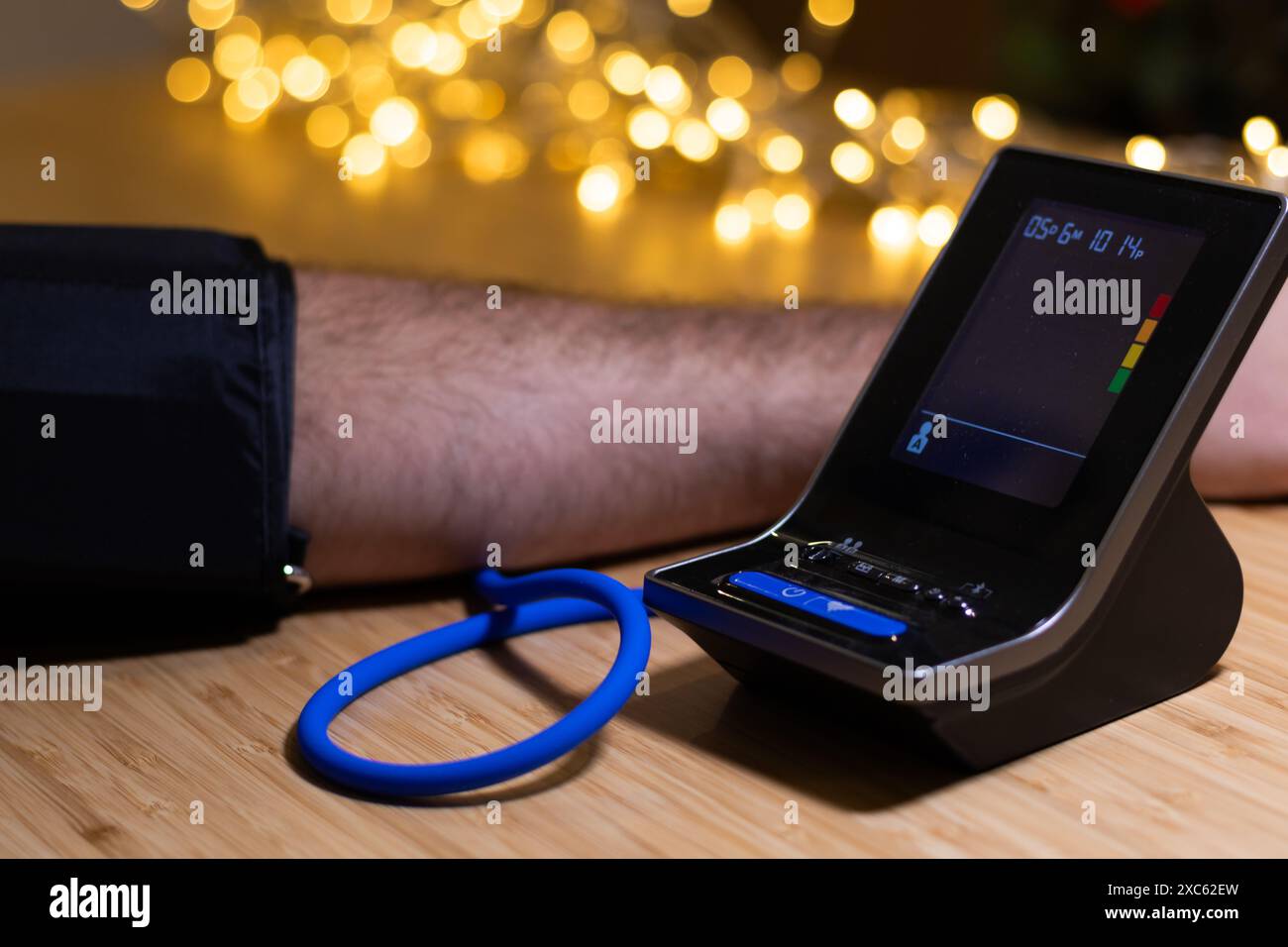Hypertension Problem. Young man Measuring Arterial Blood Pressure ...
