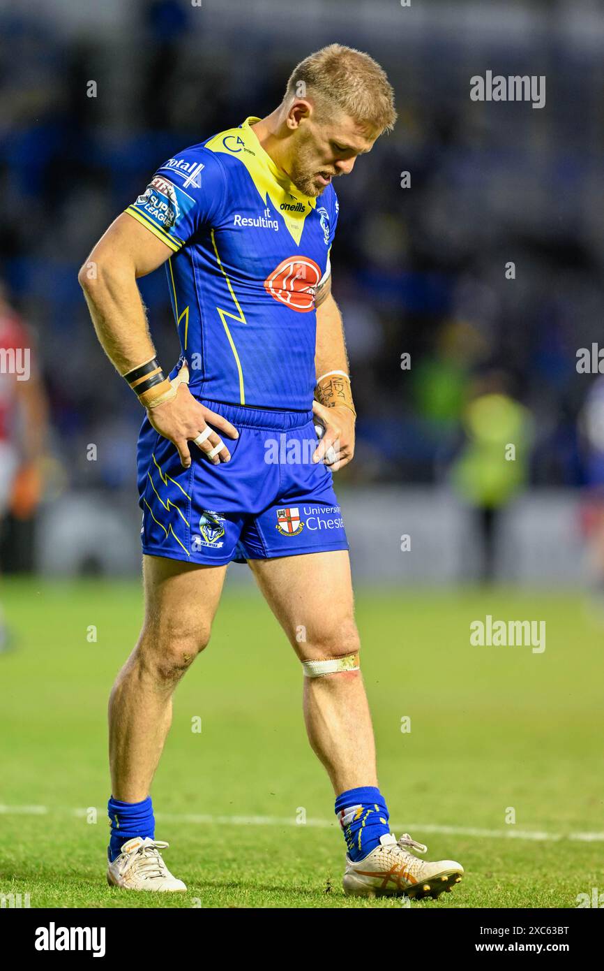 Matt Dufty of Warrington Wolves looks dejected at full time during the ...
