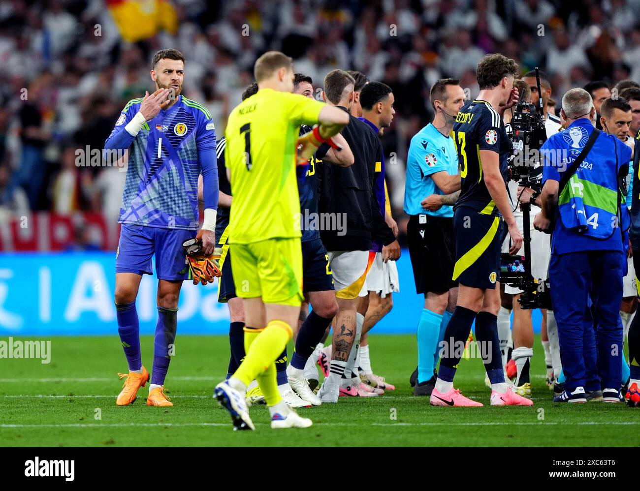 Scotland goalkeeper Angus Gunn (left) at the end of the UEFA Euro 2024 ...