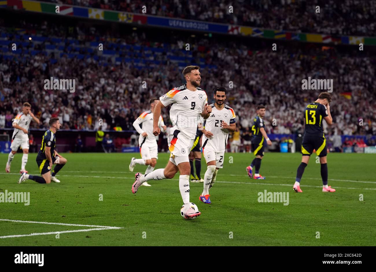 Germany's Niclas Fullkrug celebrates scoring their side's fourth goal ...