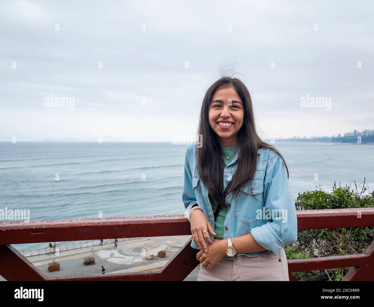 Lima, Peru - July 30 2023: Peruvian Woman Poses on a Balcony with the ...