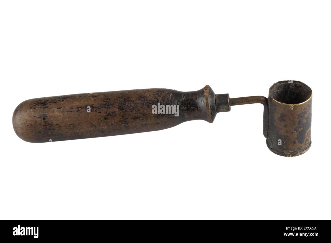 Antique black powder measure for loading cartridge. Isolated on a white ...