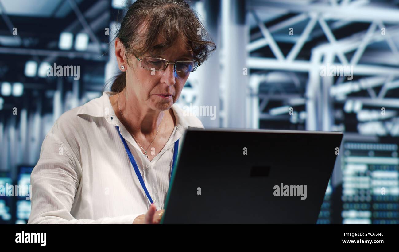 Knowledgeable repairman working in high tech workspace housing GPU ...