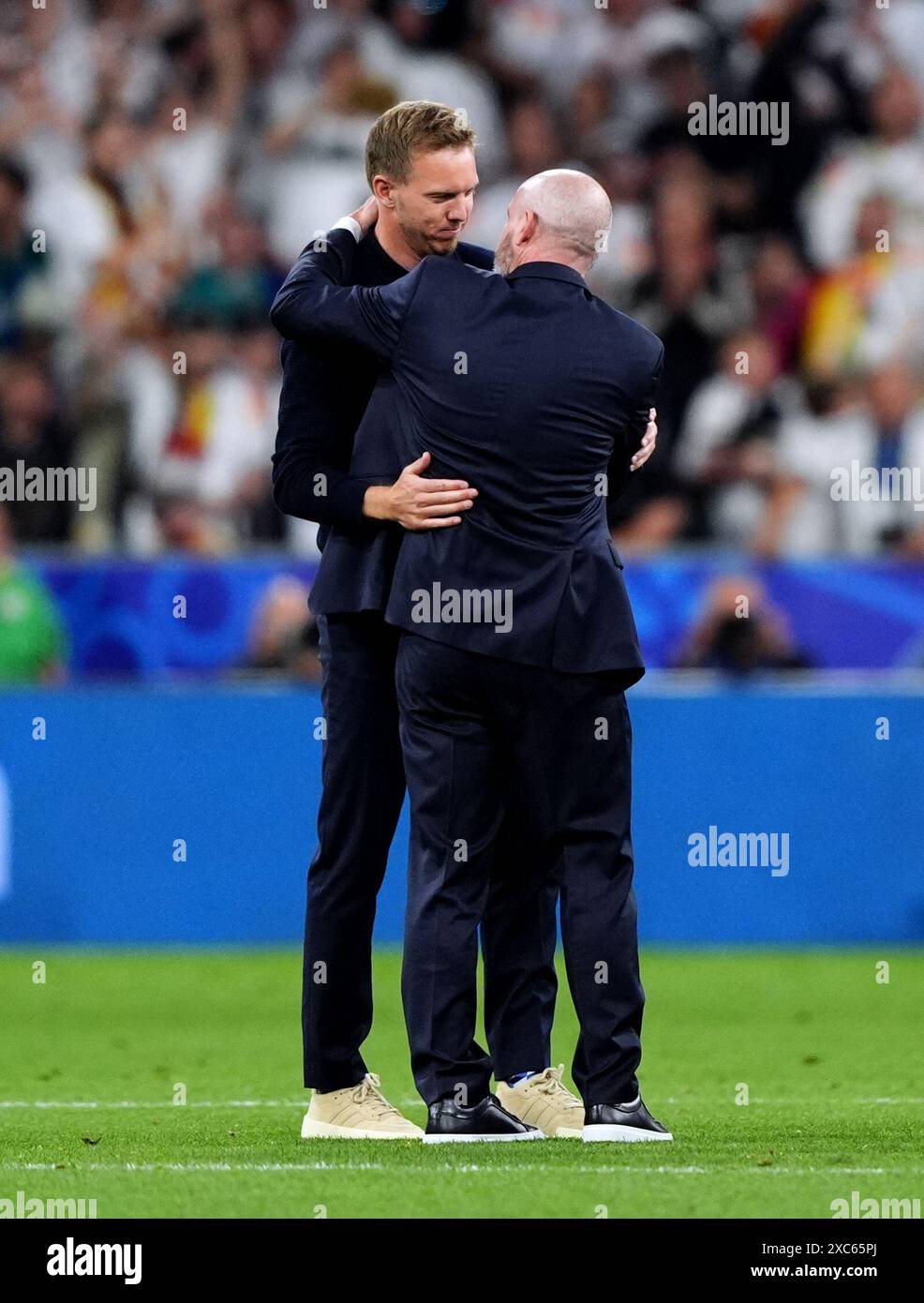 Scotland manager Steve Clarke speaks to Germany manager Julian ...