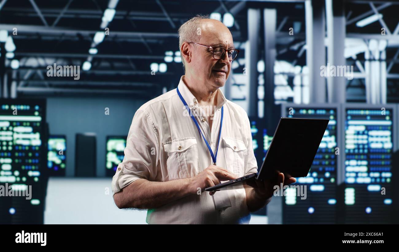 Focused IT professional navigating network of blade servers in ...