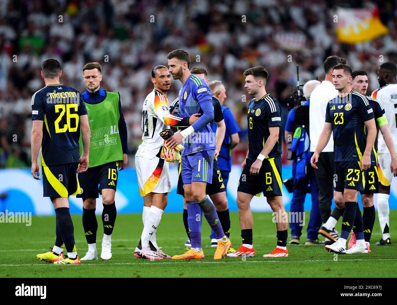 Germany's Leroy Sane hugs Scotland goalkeeper Angus Gunn at the end of ...