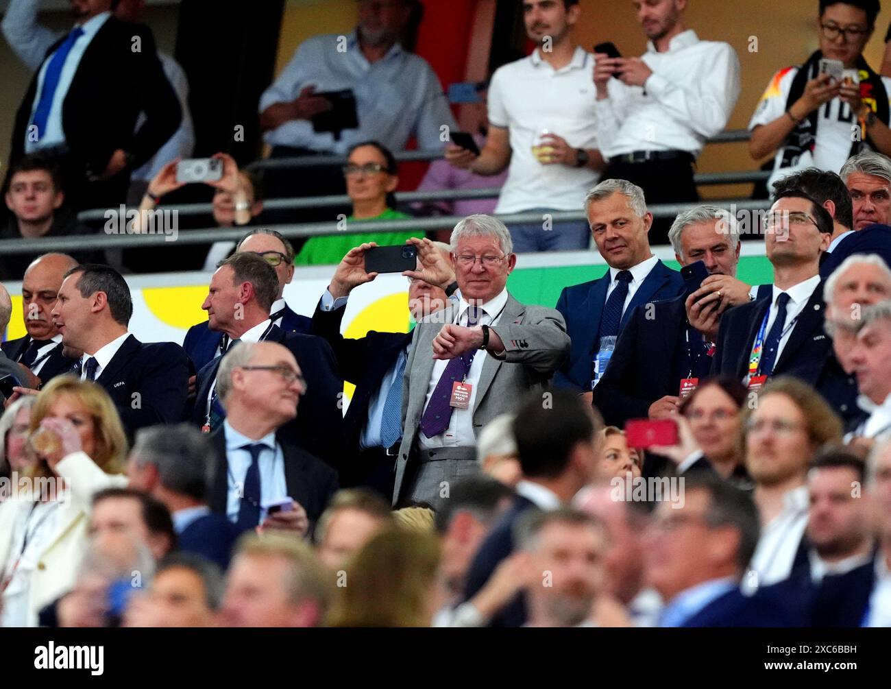 Sir Alex Ferguson (centre) in the stands ahead of the UEFA Euro 2024 ...