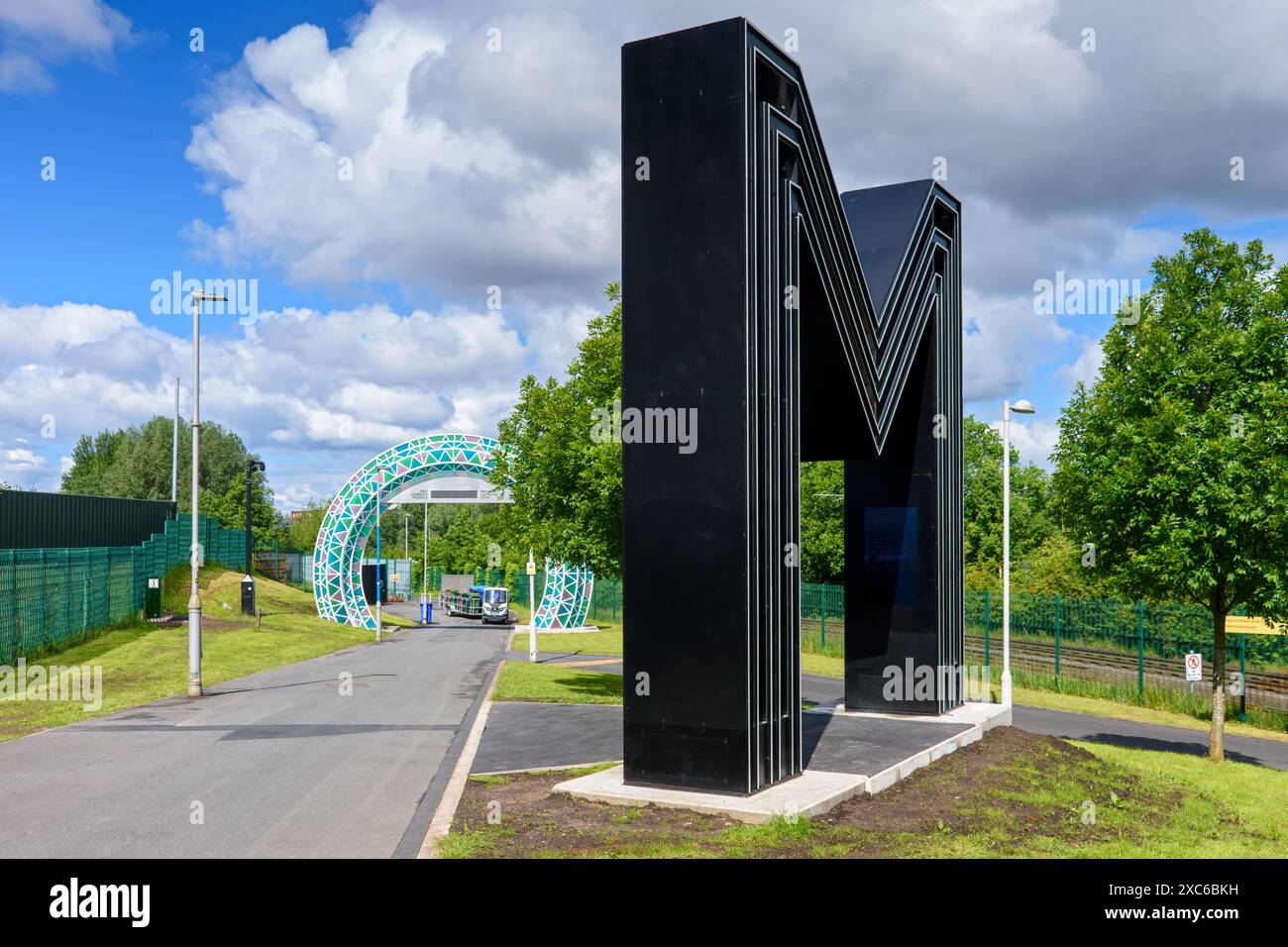Giant M sculpture on the 'CityLink' walking route between the Etihad ...