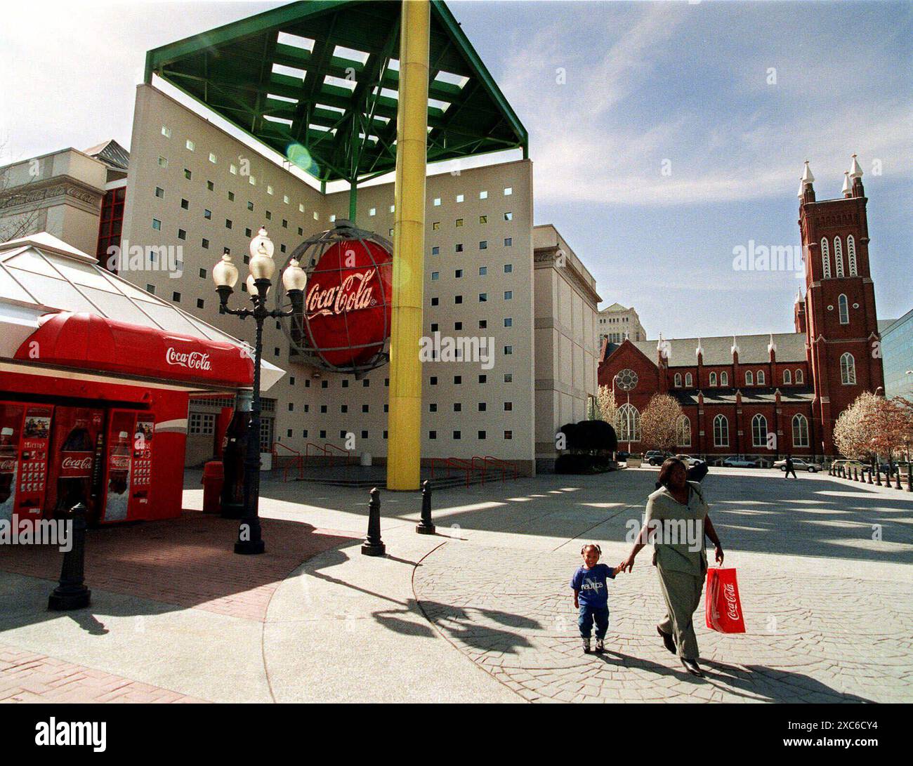 FILE - Emily Robinson and two-year-old Amari Peacock leave the plaza ...