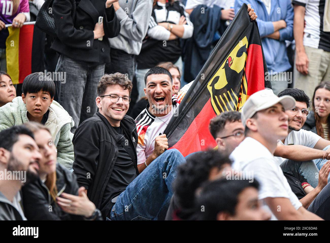 Frankfurt, Germany. 14 June, 2024. Fans watch the UEFA EURO 2024 ...