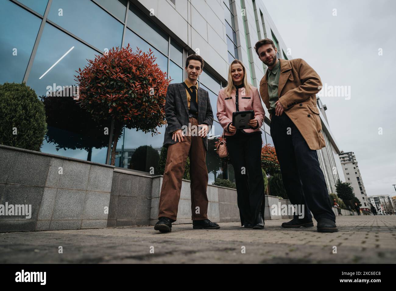 Business colleagues discussing project strategy outdoors Stock Photo ...